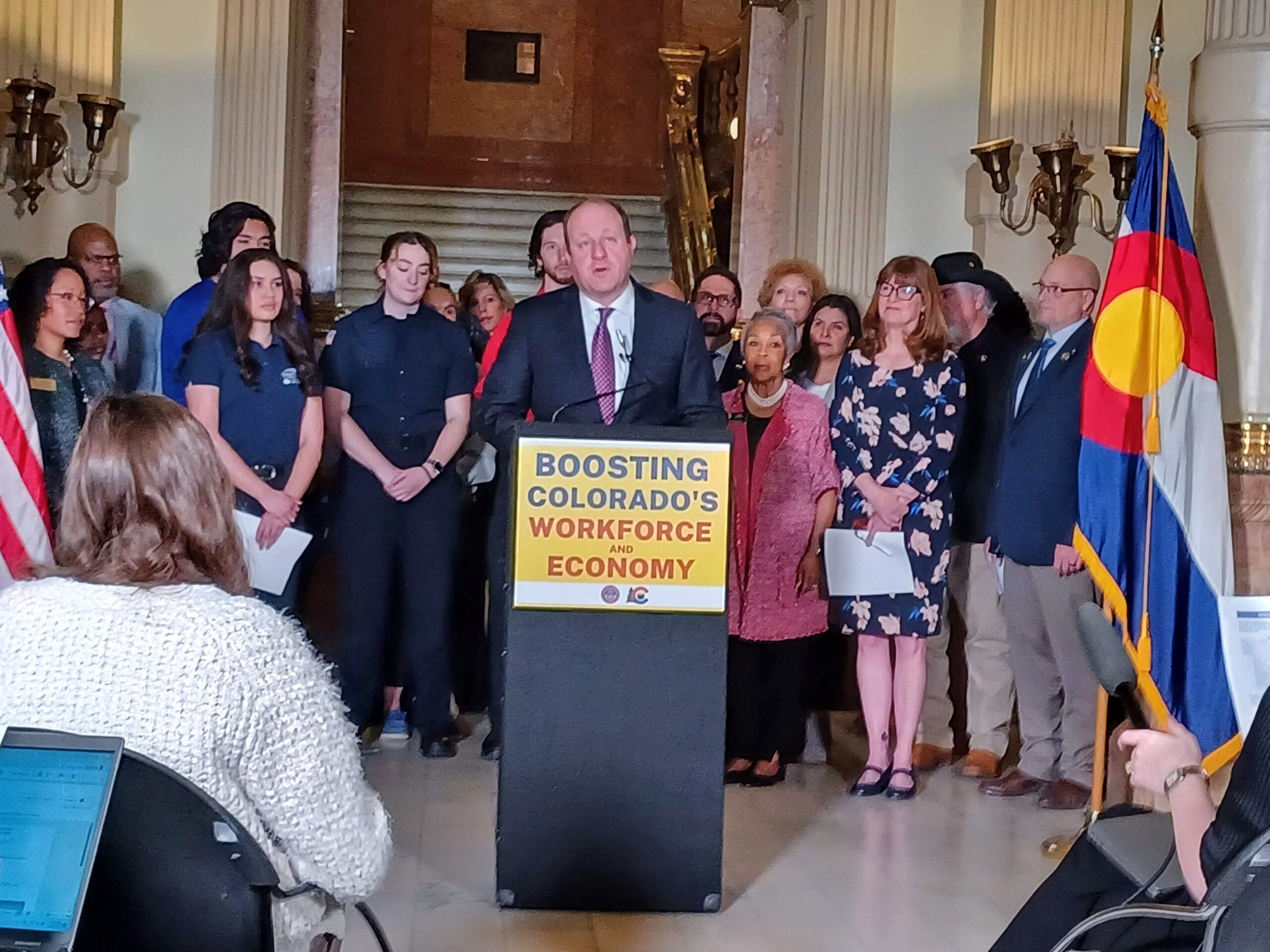 Polis, legislators unveil workforce bill package | The Sum and Substance